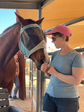 Mary Beth Gibson with her horse - Escape to THRIVE